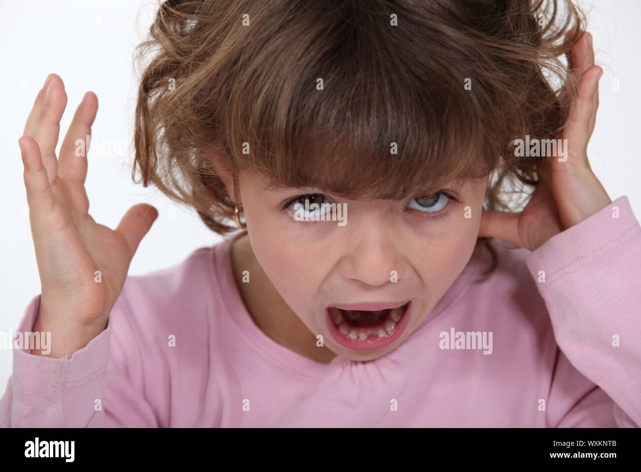 A little girl screaming Stock Photo - Alamy
