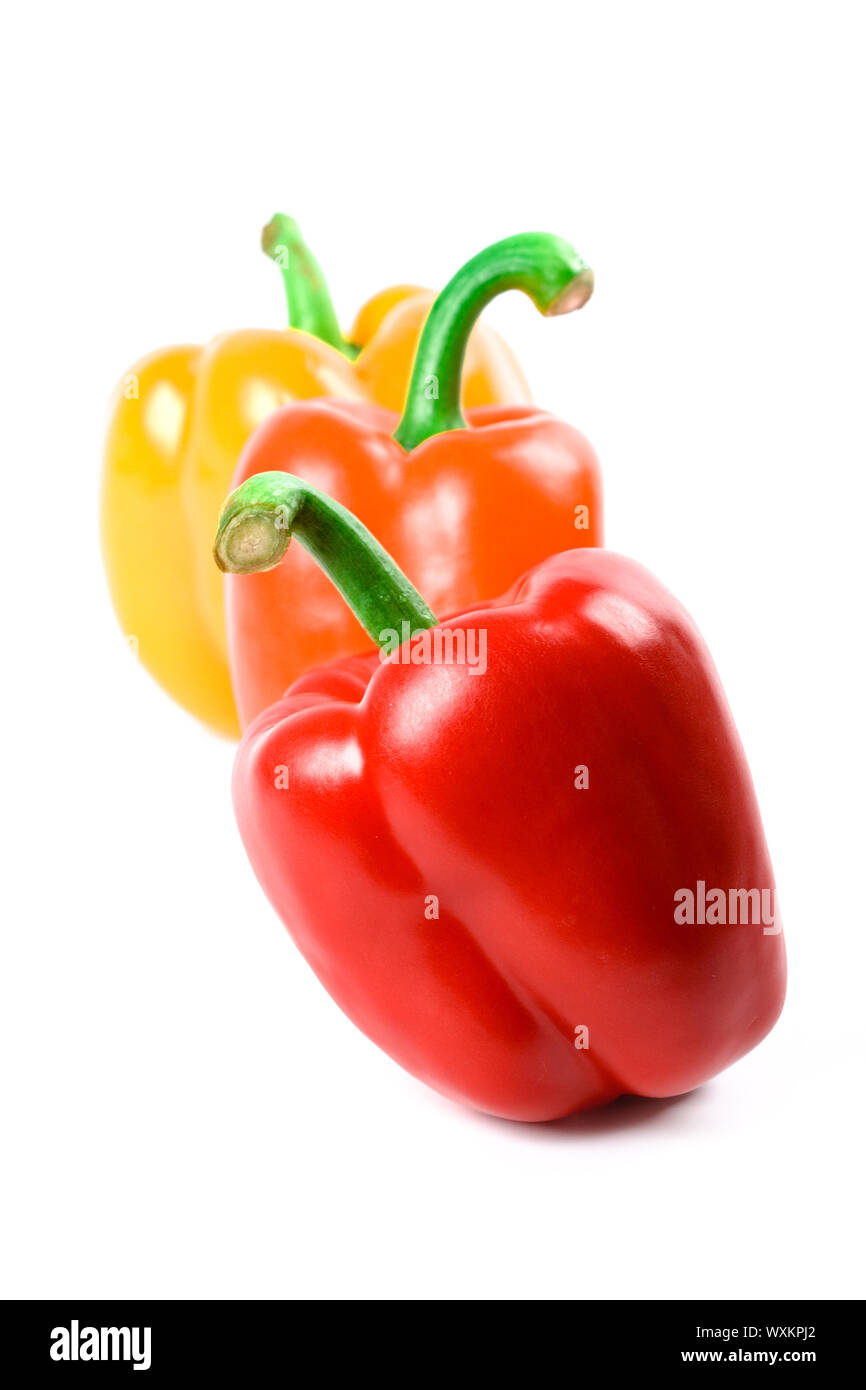 three bell peppers isolated on white background Stock Photo - Alamy