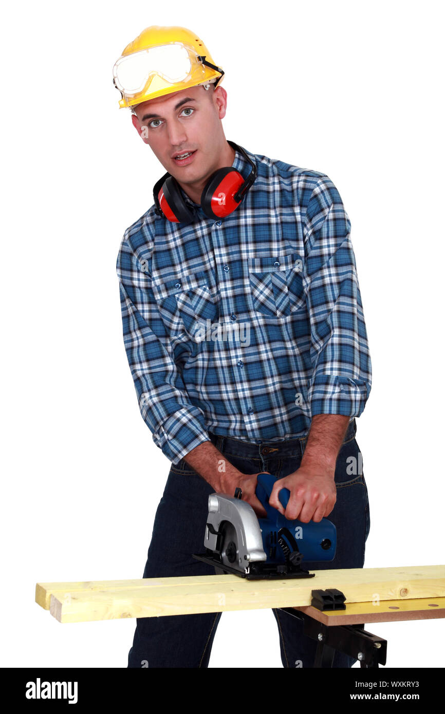 Sawing wood electric saw Cut Out Stock Images & Pictures - Alamy