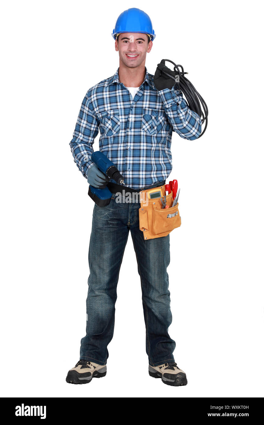 Craftsman with tools and hand drill Stock Photo - Alamy