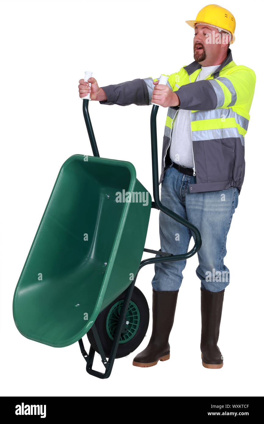 Transporting transport wheelbarrow Cut Out Stock Images & Pictures - Alamy