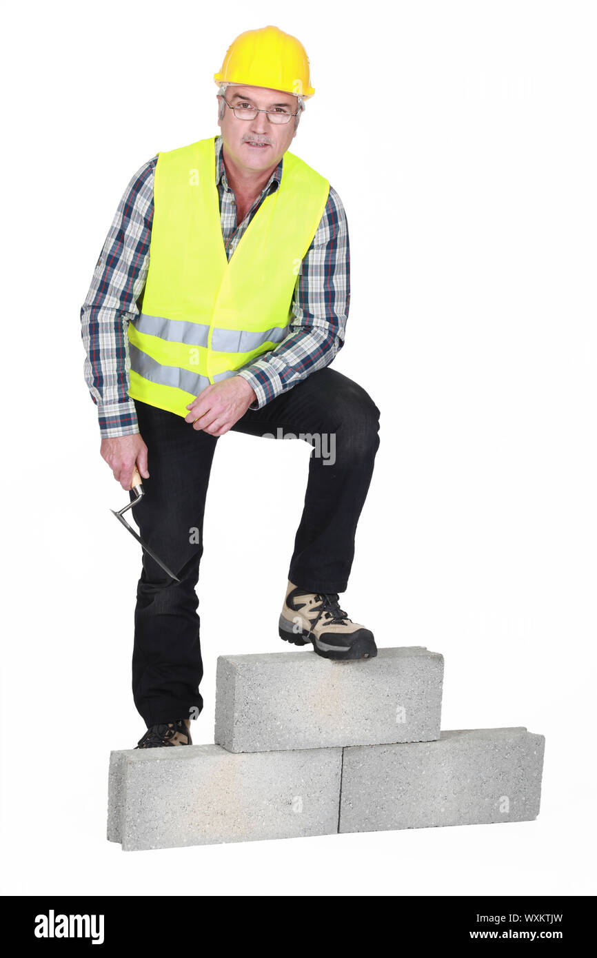 Portrait of a stonemason Stock Photo - Alamy