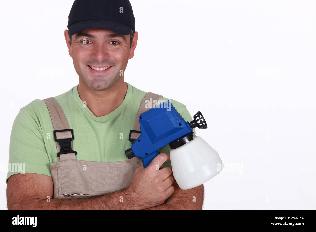 Man with a pressure sprayer Stock Photo - Alamy