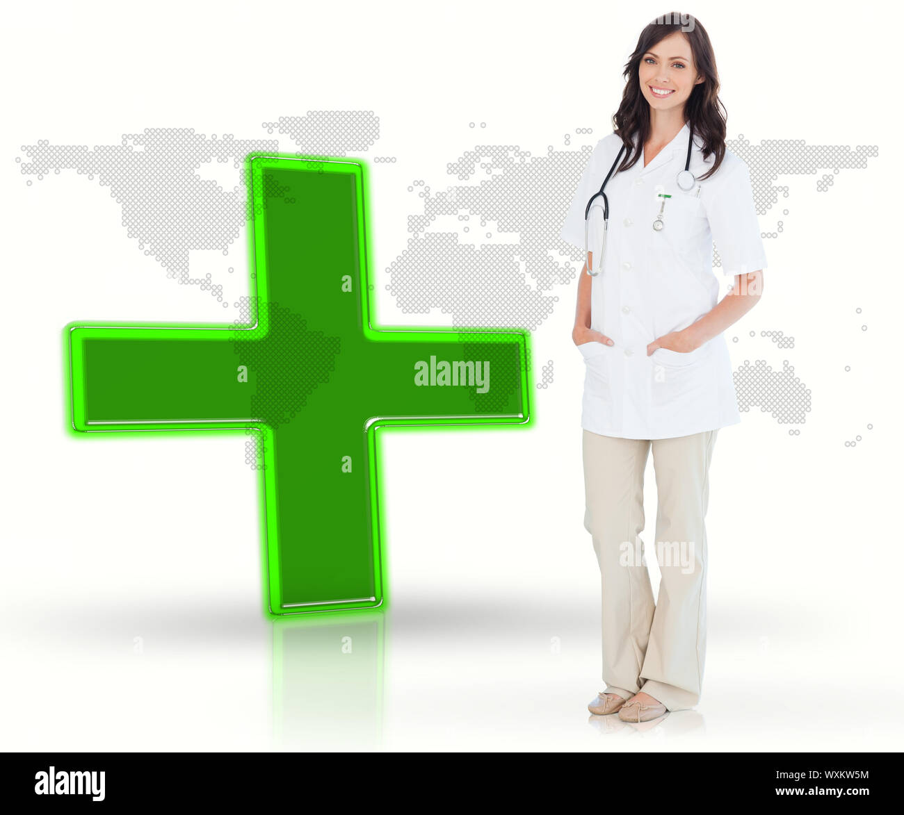 Nurse standing by digital green cross on world map background Stock ...