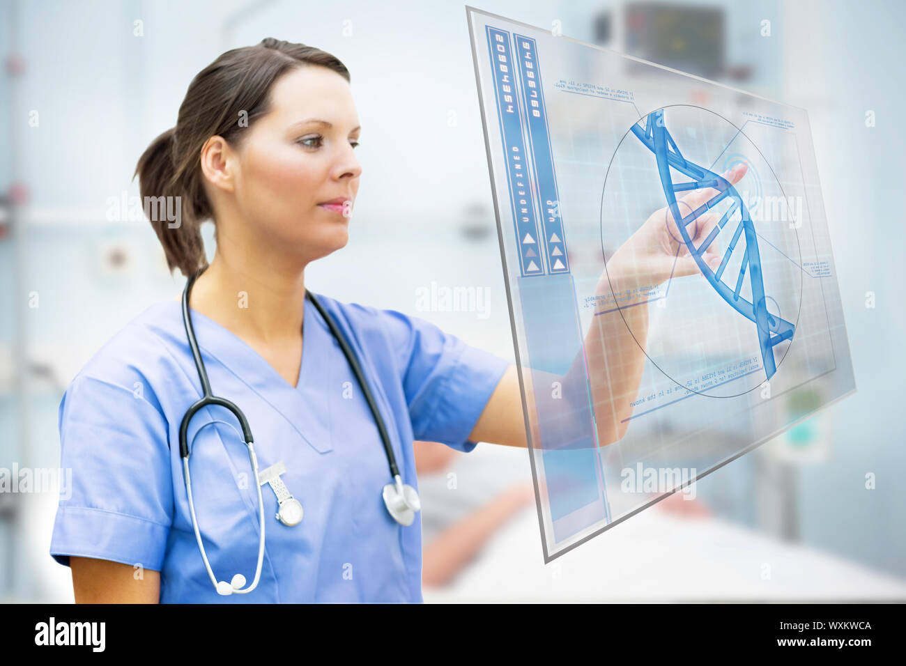 Nurse touching screen displaying blue DNA helix in hospital ward Stock ...