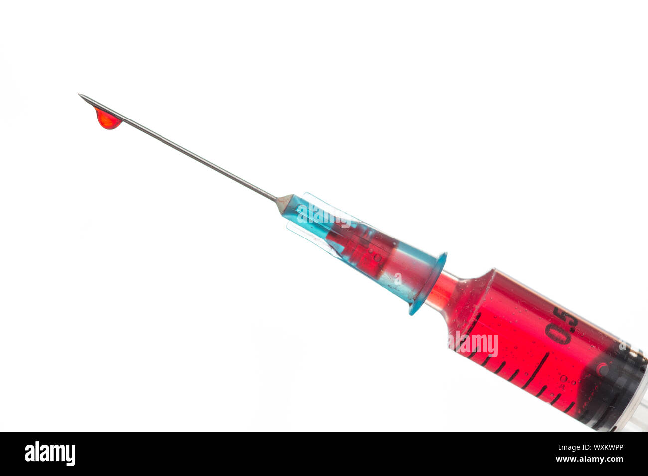 Blood filled syringe on white background Stock Photo - Alamy