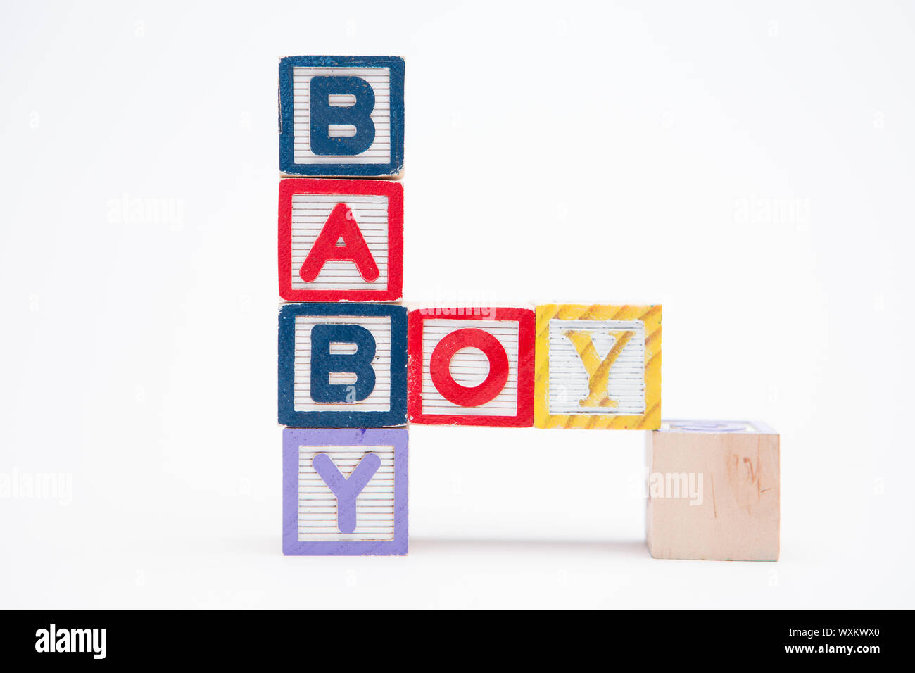 Blocks spelling baby boy on white background Stock Photo - Alamy