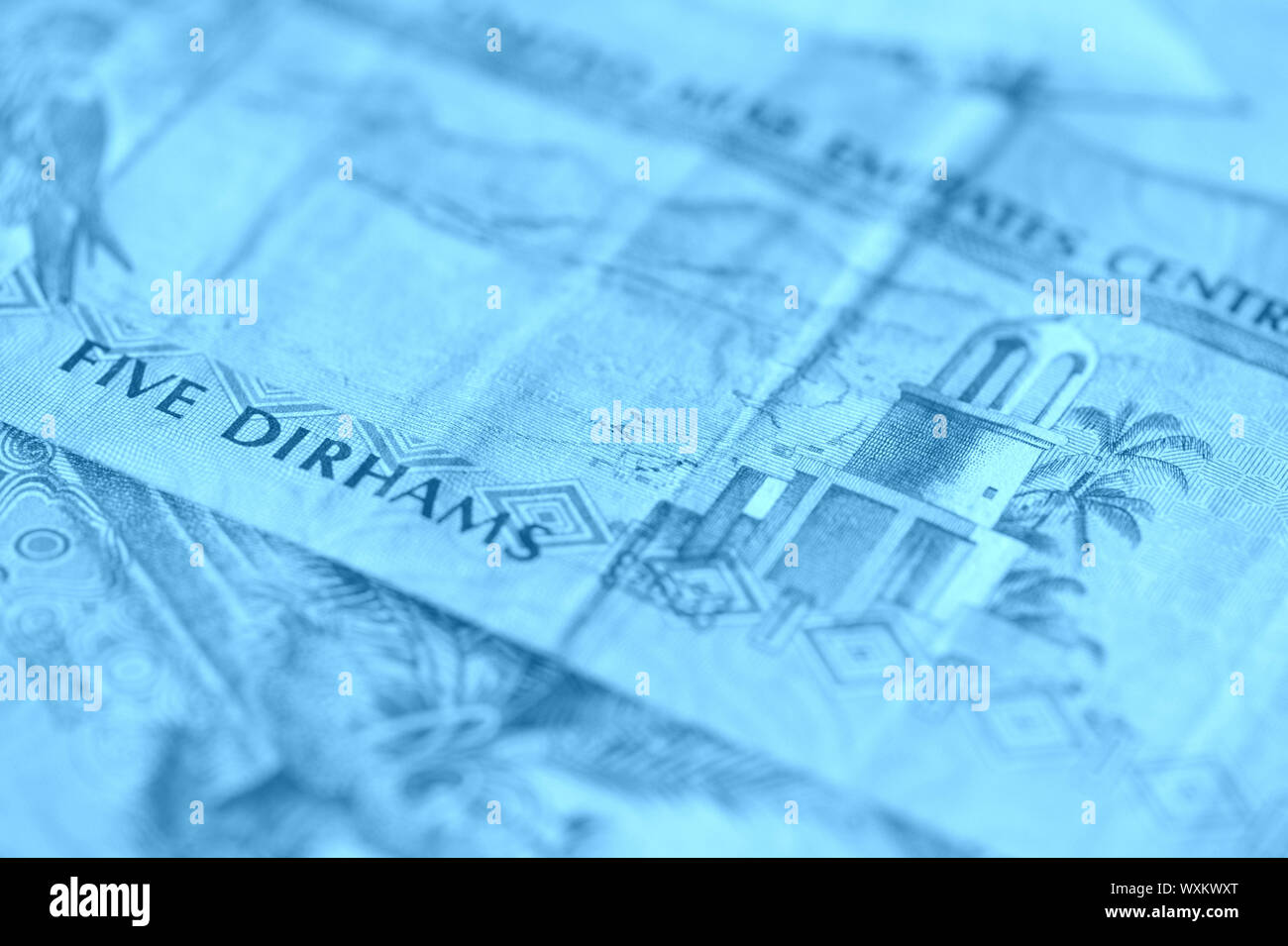 United Arab Emirates banknotes close up blue color toned Stock Photo ...