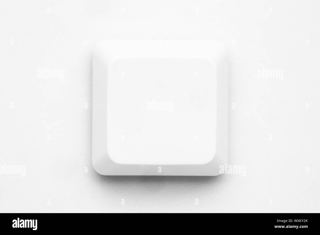 Single neutral white key of keyboard Stock Photo - Alamy