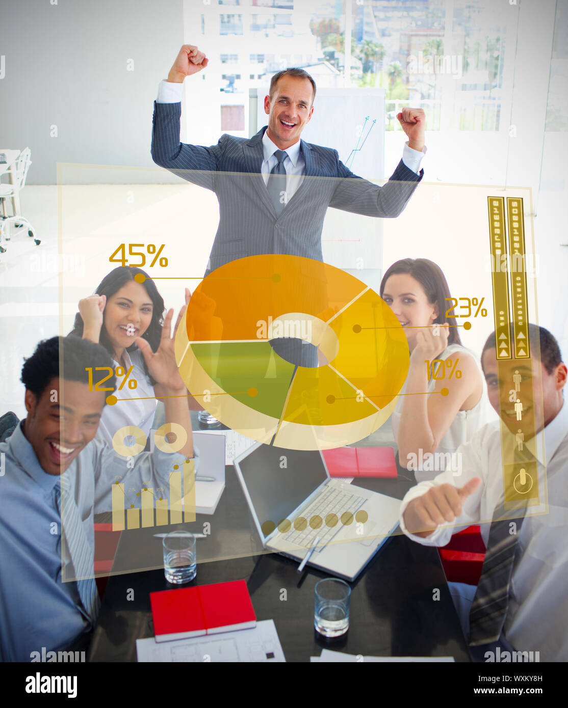 Cheerful business people using yellow pie chart interface in a meeting ...