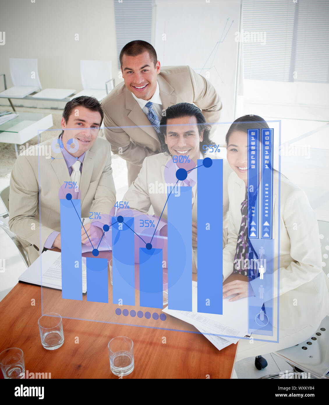 Overview of cheerful colleagues using blue chart interface in a meeting ...