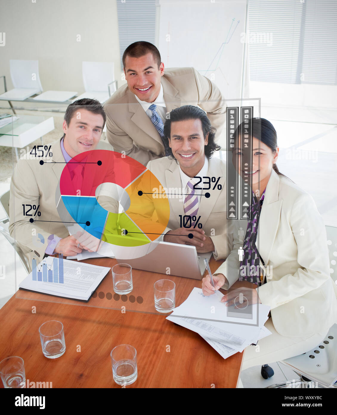 Overview of happy colleagues using colorful pie chart interface in a ...