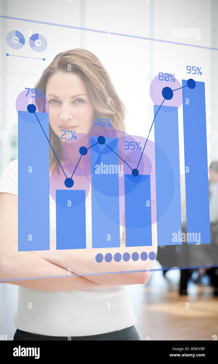Confident businesswoman looking at blue diagram interface with ...