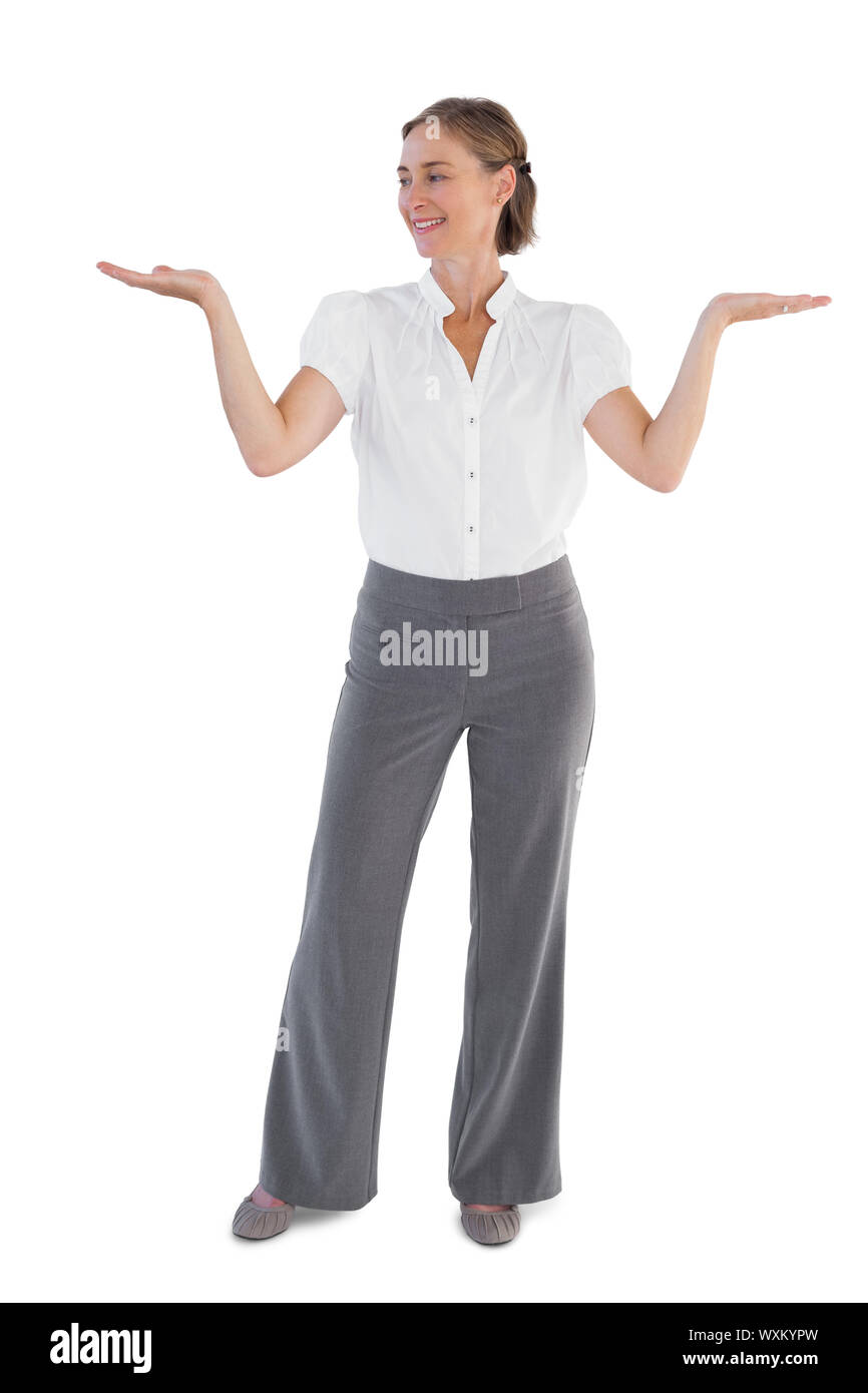 Businesswoman presenting something with her two hands raised on white ...