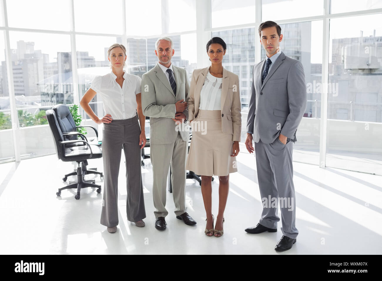 Group of business people standing in line in the meeting room Stock ...