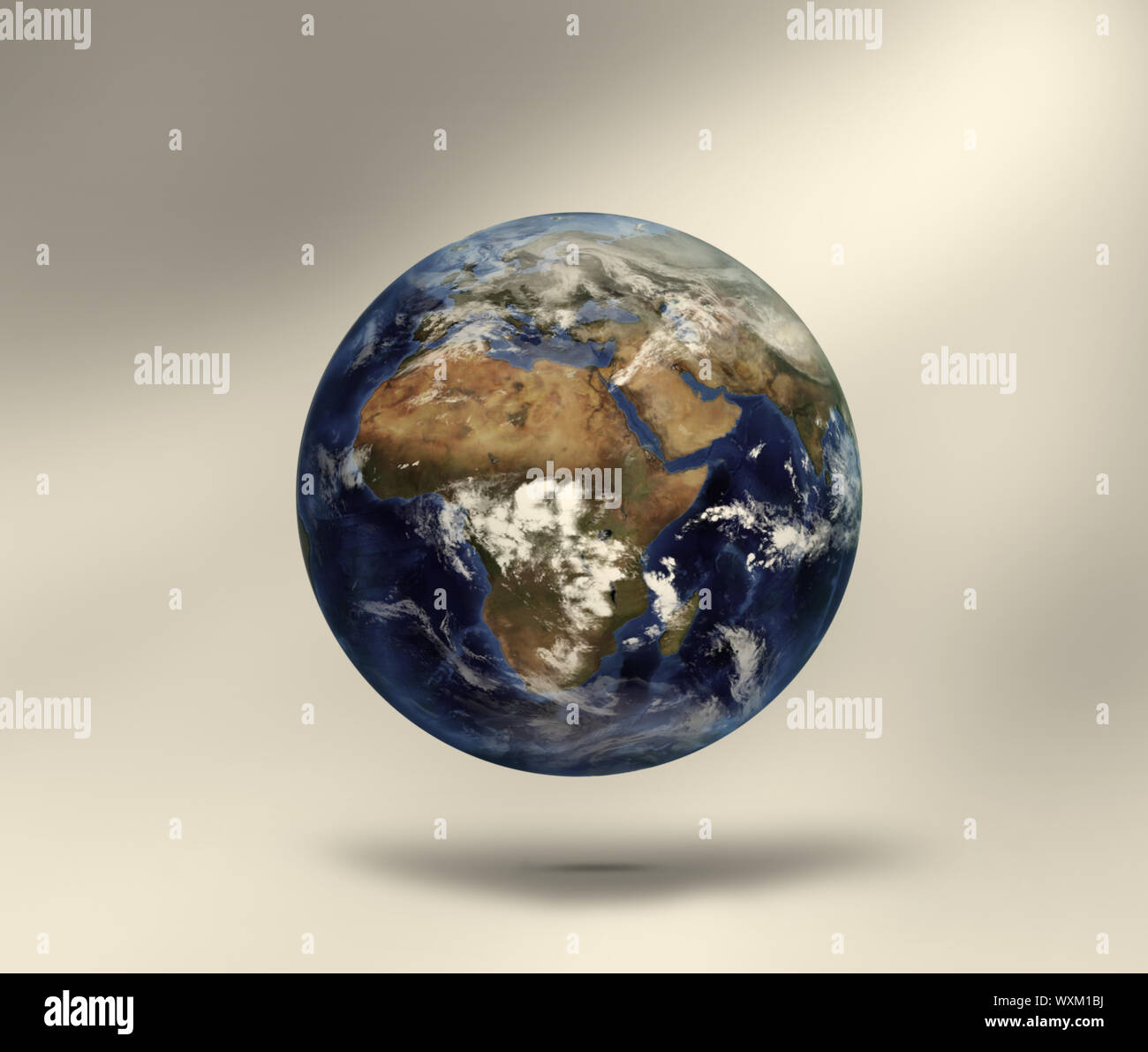 Planet earth floating on white background Stock Photo - Alamy