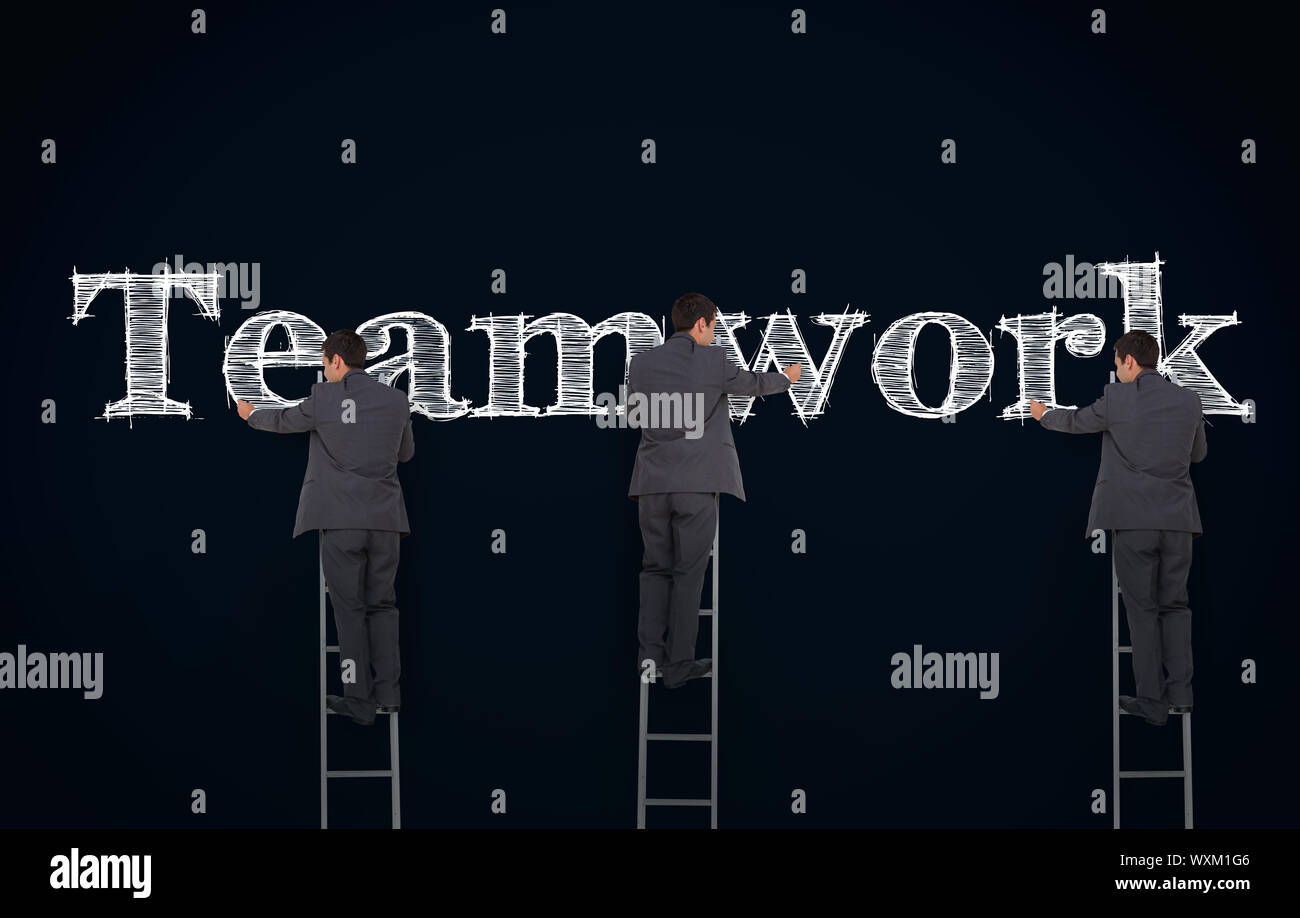 Multiple image of a businessman writing teamwork on a giant blackboard ...