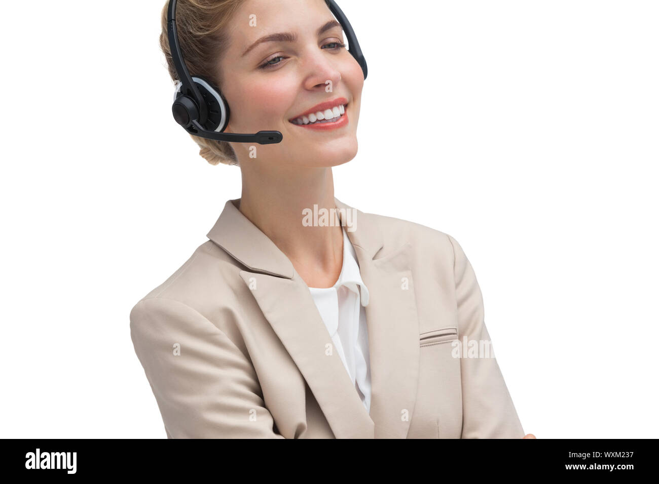 Customer service agent smiling at the camera with headset Stock Photo ...