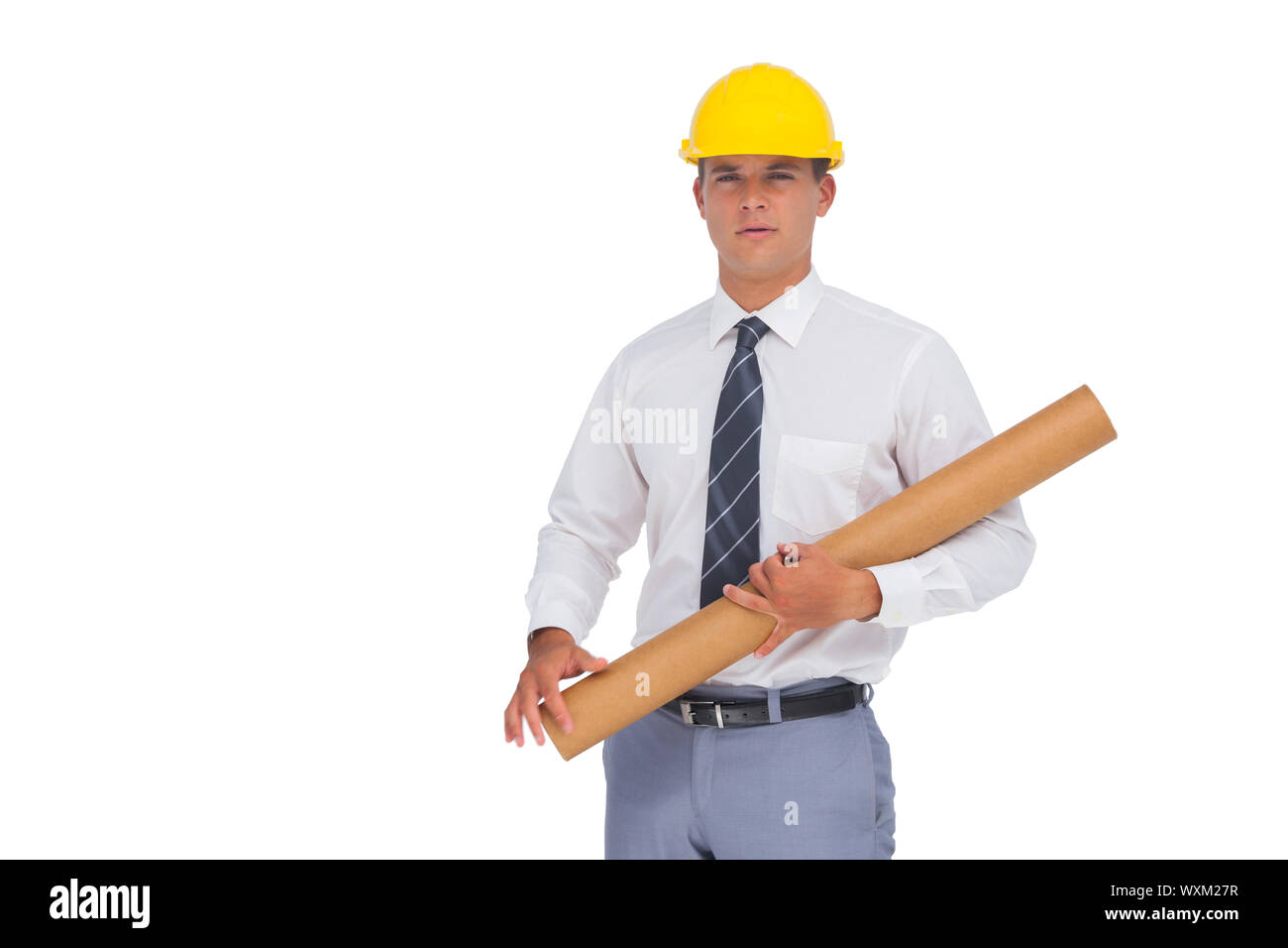 Architect holding a rolled up blueprint on white background Stock Photo ...