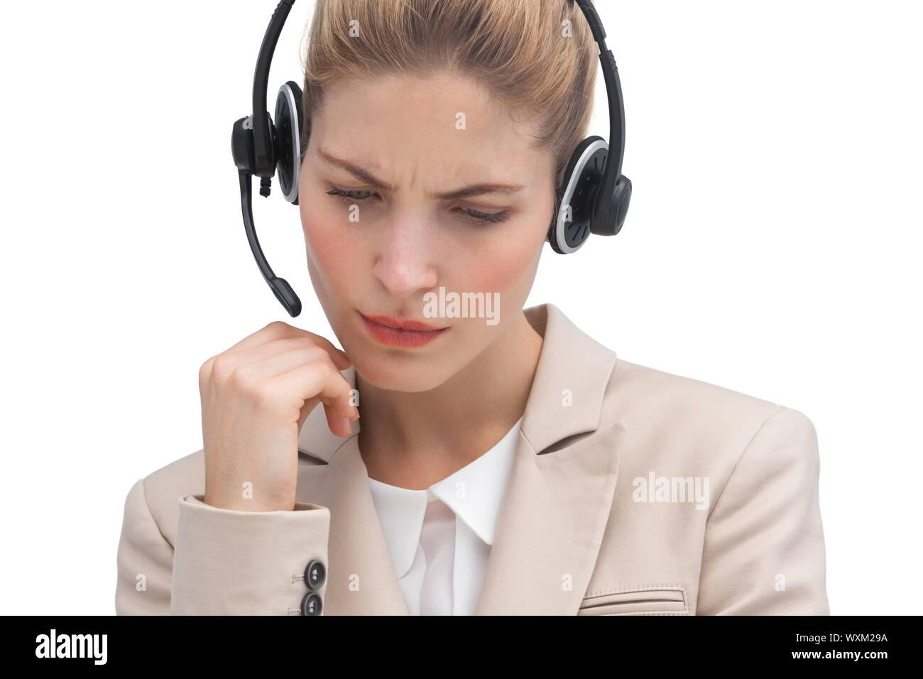 Worried call center agent with headset Stock Photo - Alamy