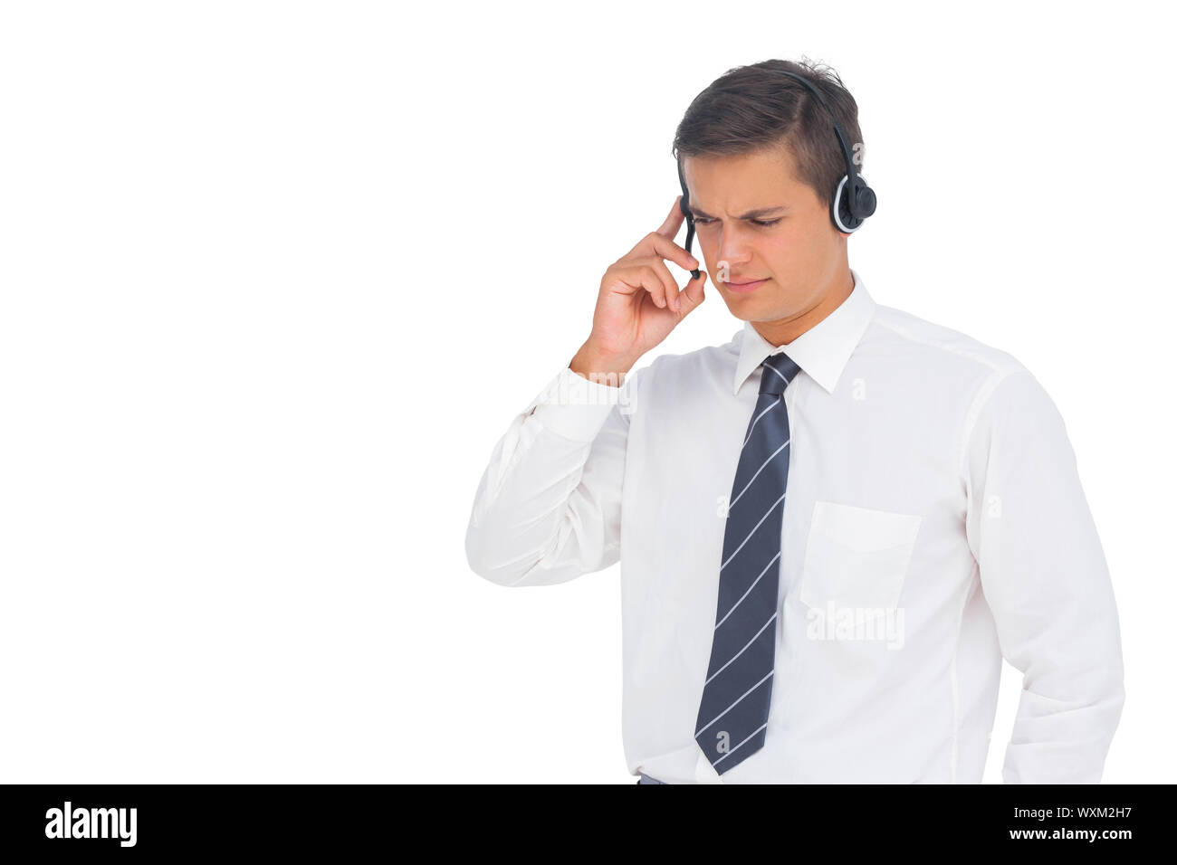Call centre agent using headset on white background Stock Photo - Alamy