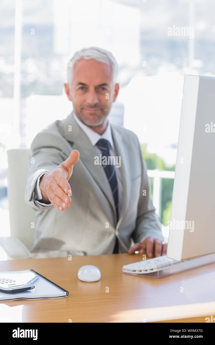 Hand reaching out computer monitor hi-res stock photography and images ...