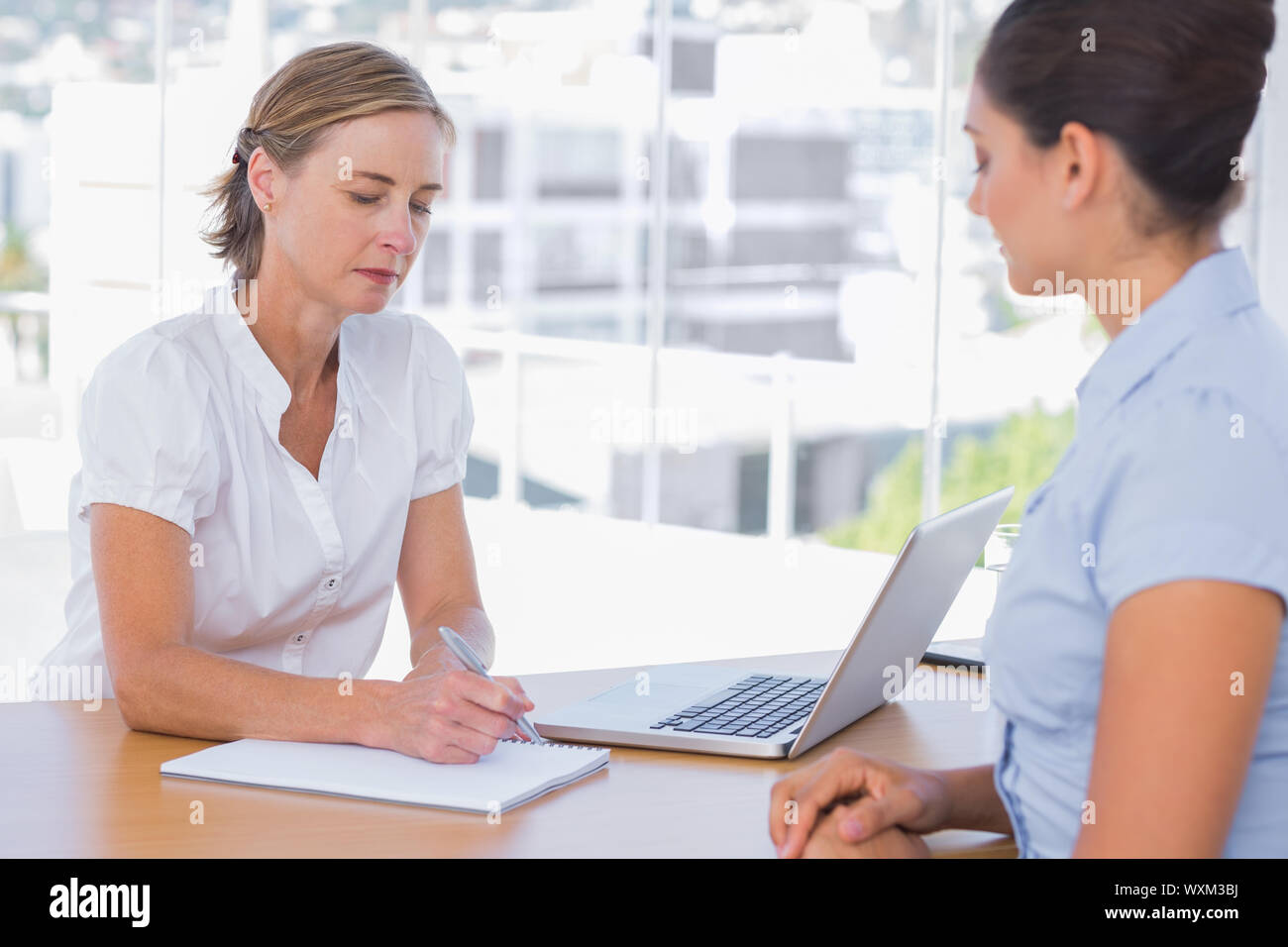 Interviewer taking notes hi-res stock photography and images - Alamy