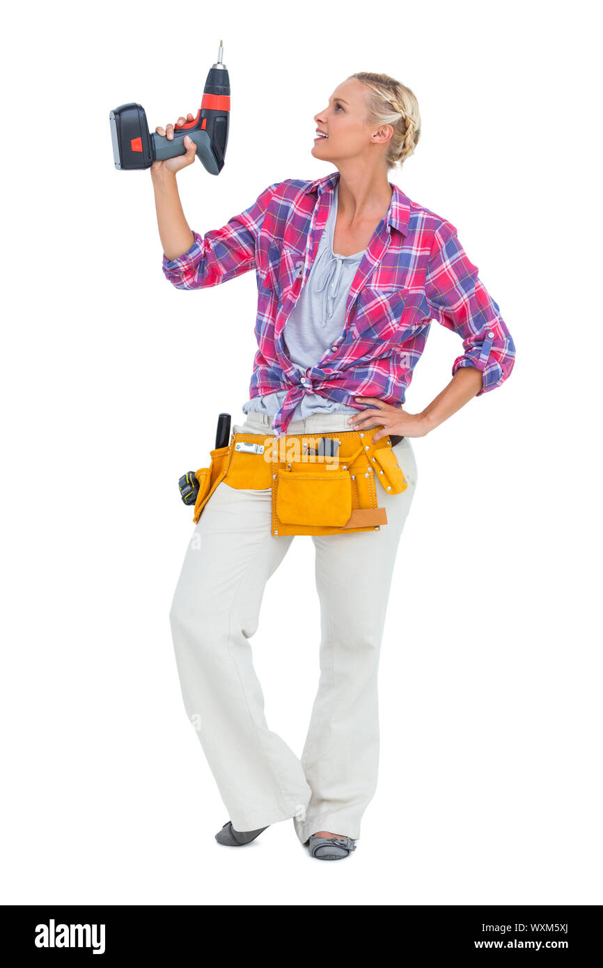 Handy woman standing with power drill against white background Stock ...