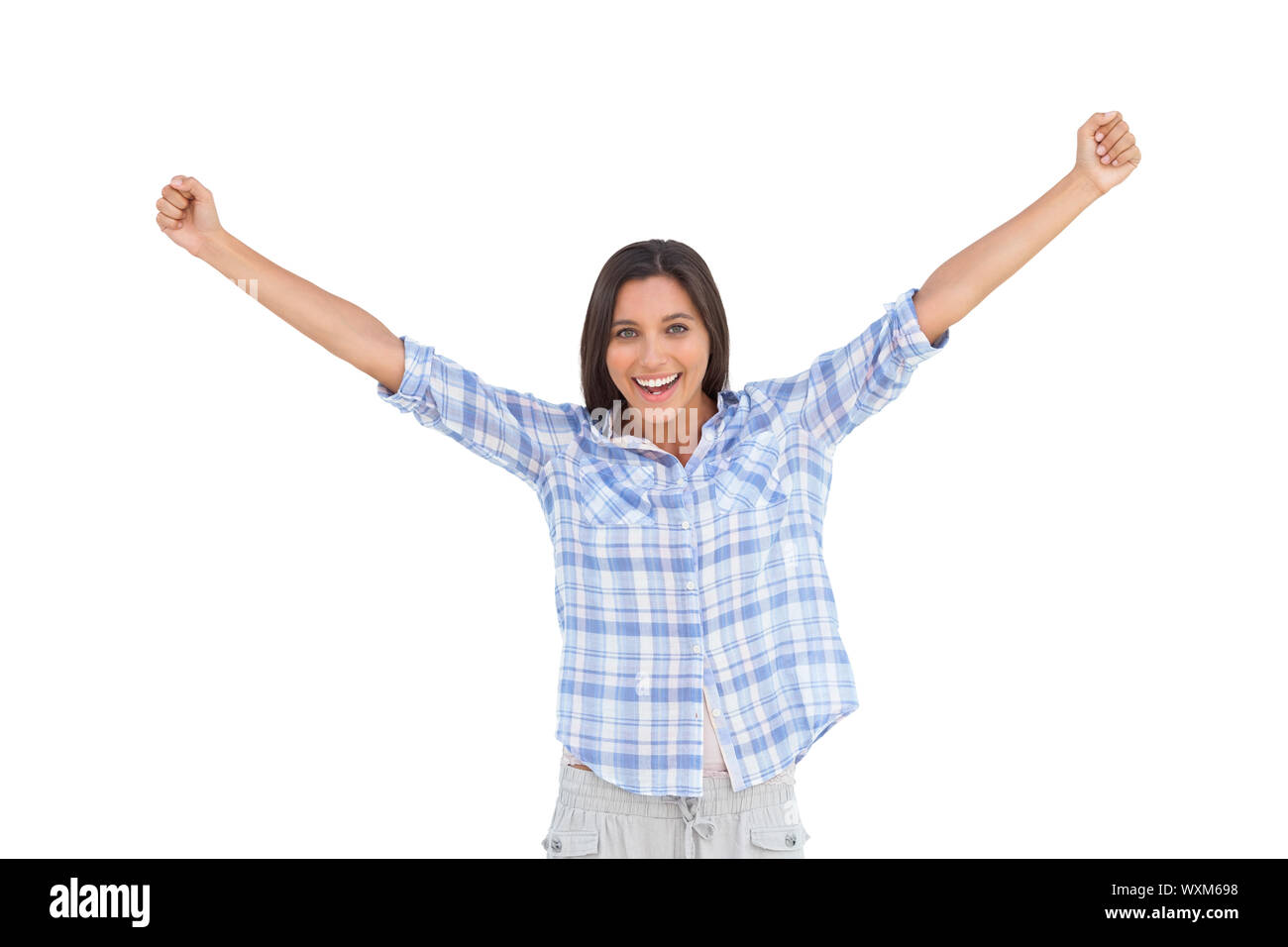 Young woman standing and raising arms on white background Stock Photo ...