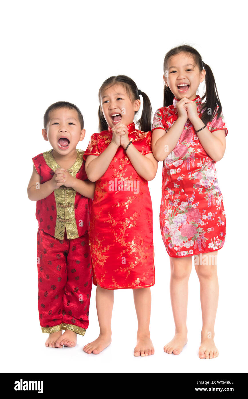 Little oriental children wishing you a happy Chinese New Year, with ...