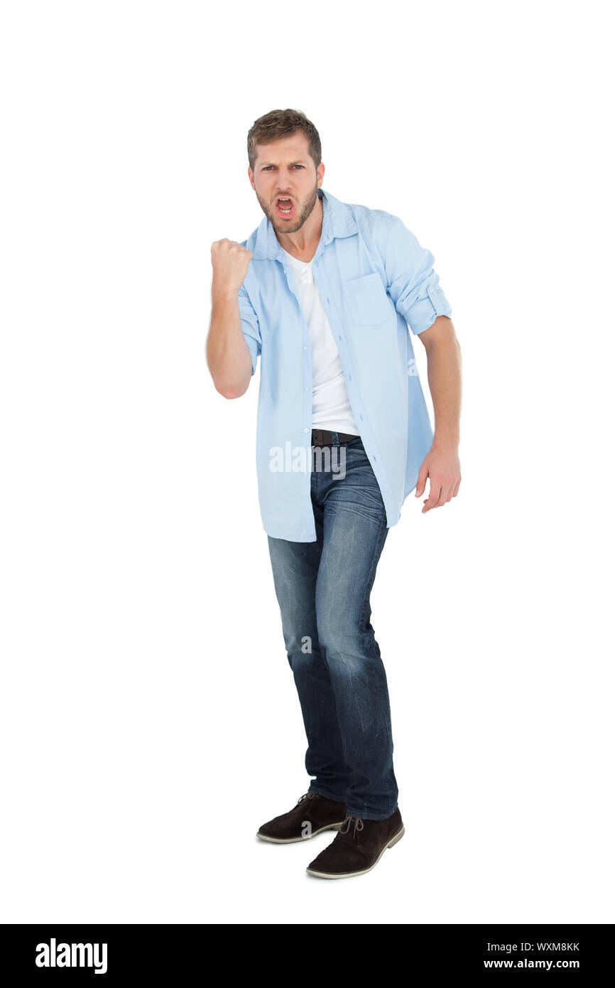 Expressive and energetic model cheering on white background Stock Photo ...