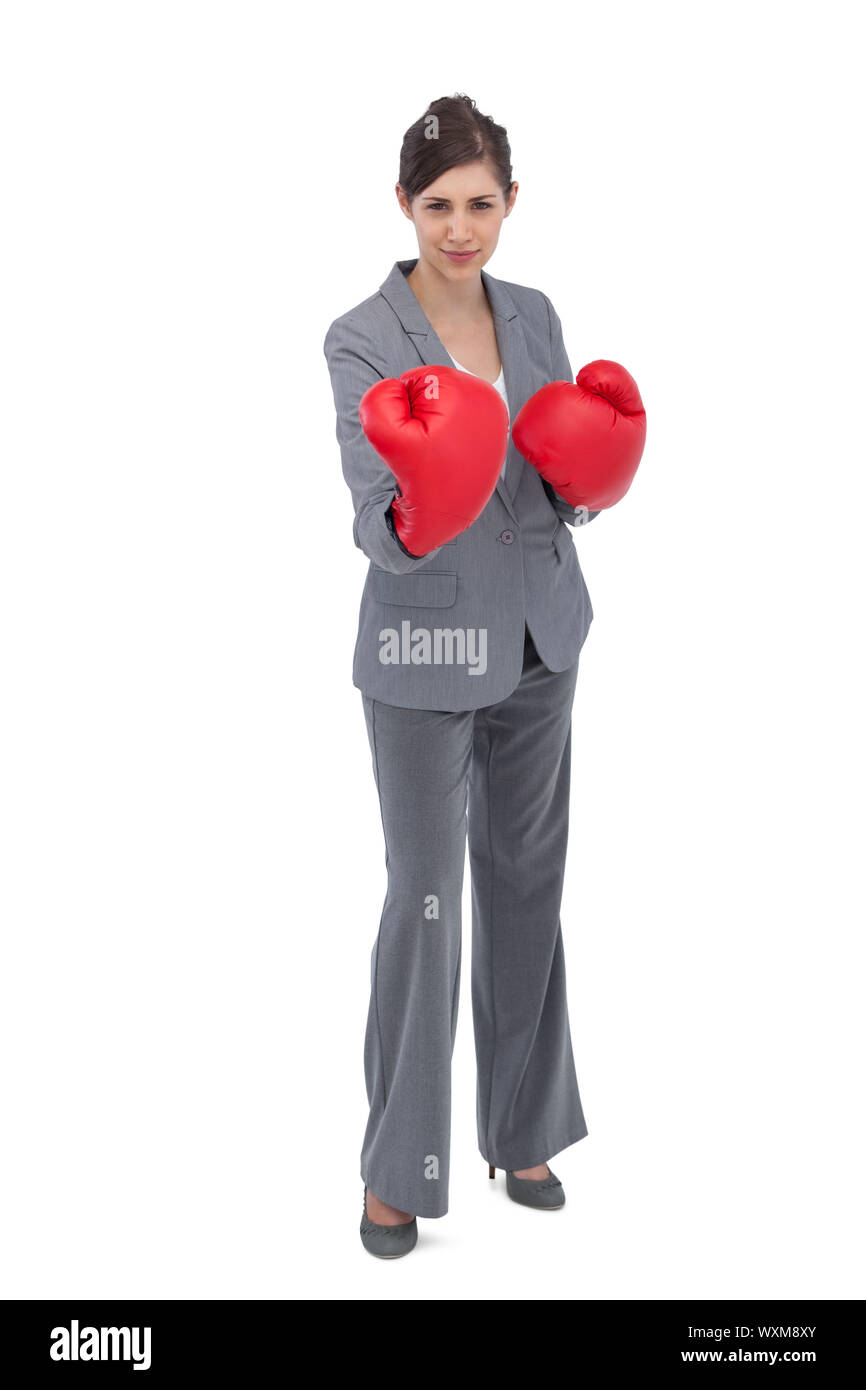 Competitive woman with boxing gloves on white background Stock Photo ...
