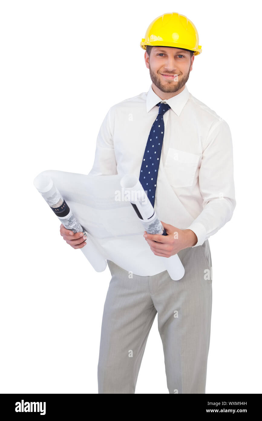 Smiling young architect posing against white background Stock Photo - Alamy