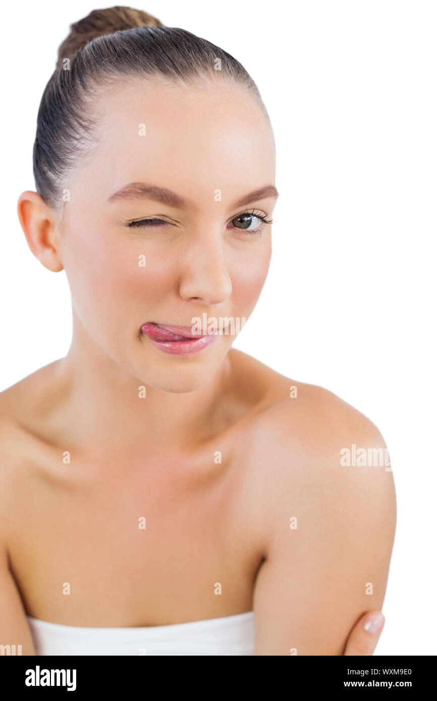 Model posing with tongue out and winking looking at camera Stock Photo ...