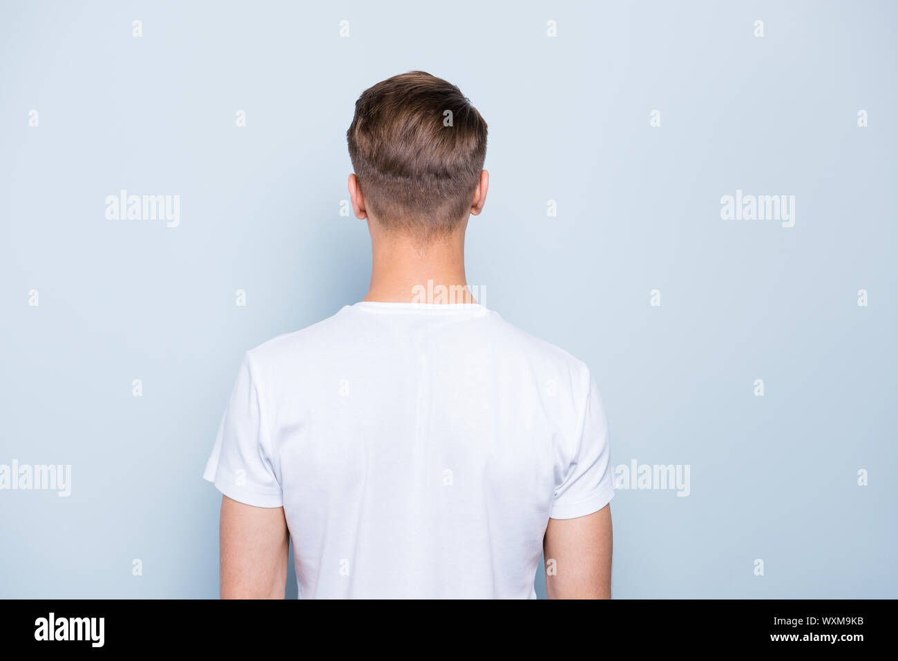 Back rear view photo of confident, attractive, nice-looking man Stock ...