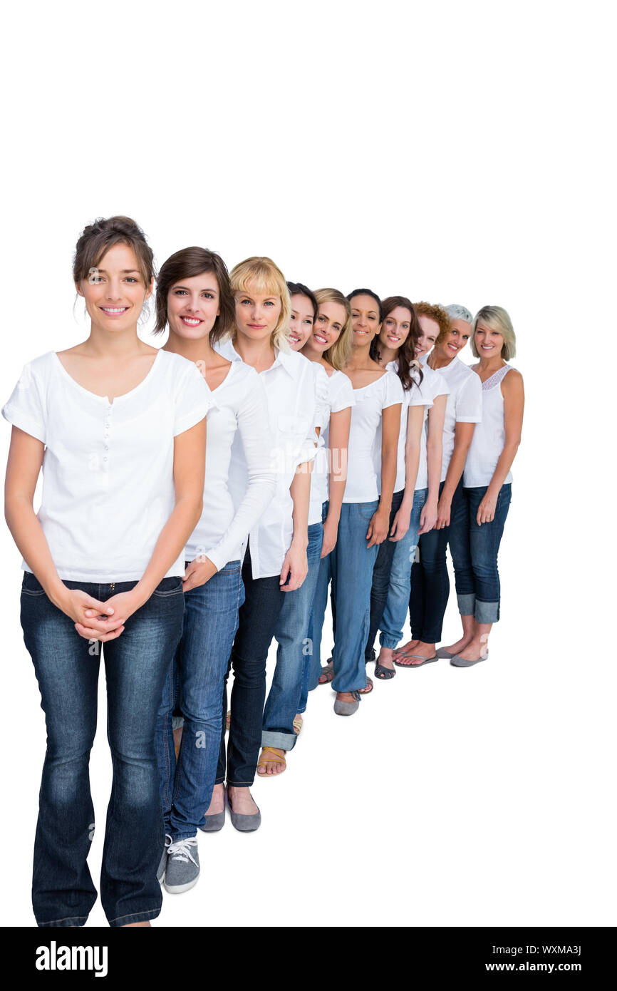 Cheerful casual models posing in a line on white background Stock Photo ...
