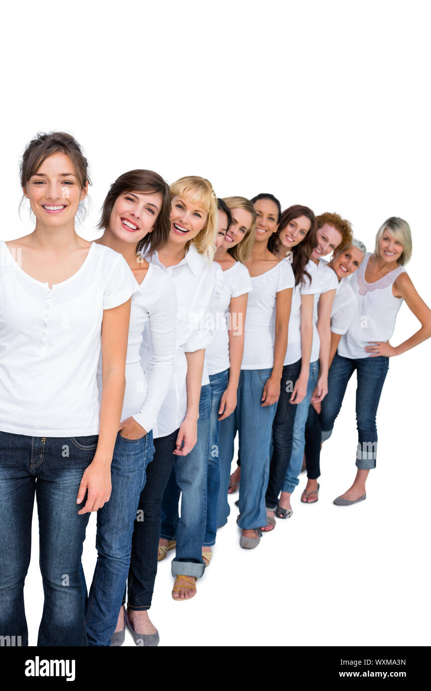 Casual models in a line looking at camera on white background Stock ...