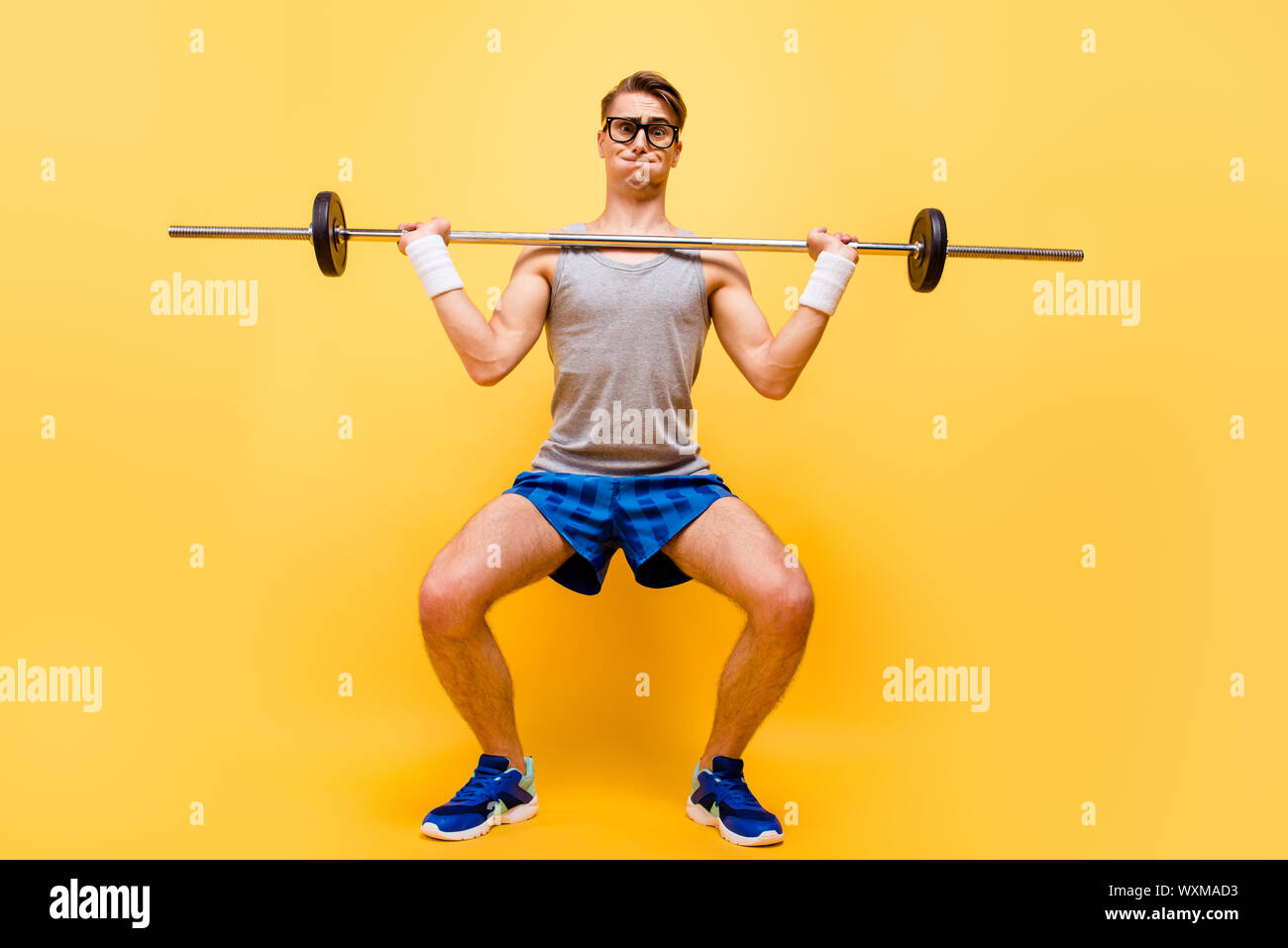 Weak Man Lifting Weights