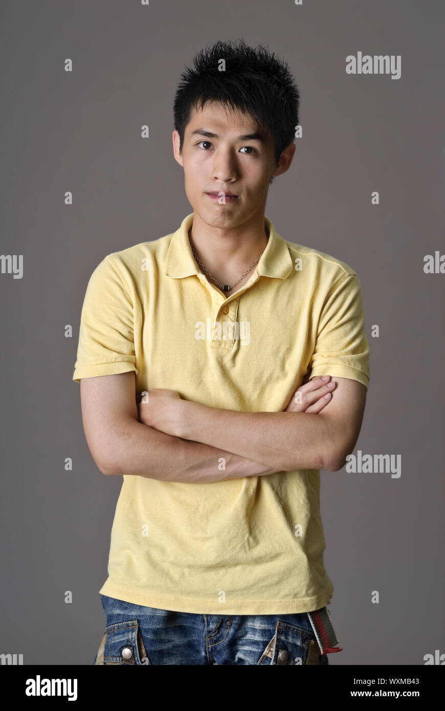 Portrait of Asian guy looking at camera Stock Photo - Alamy