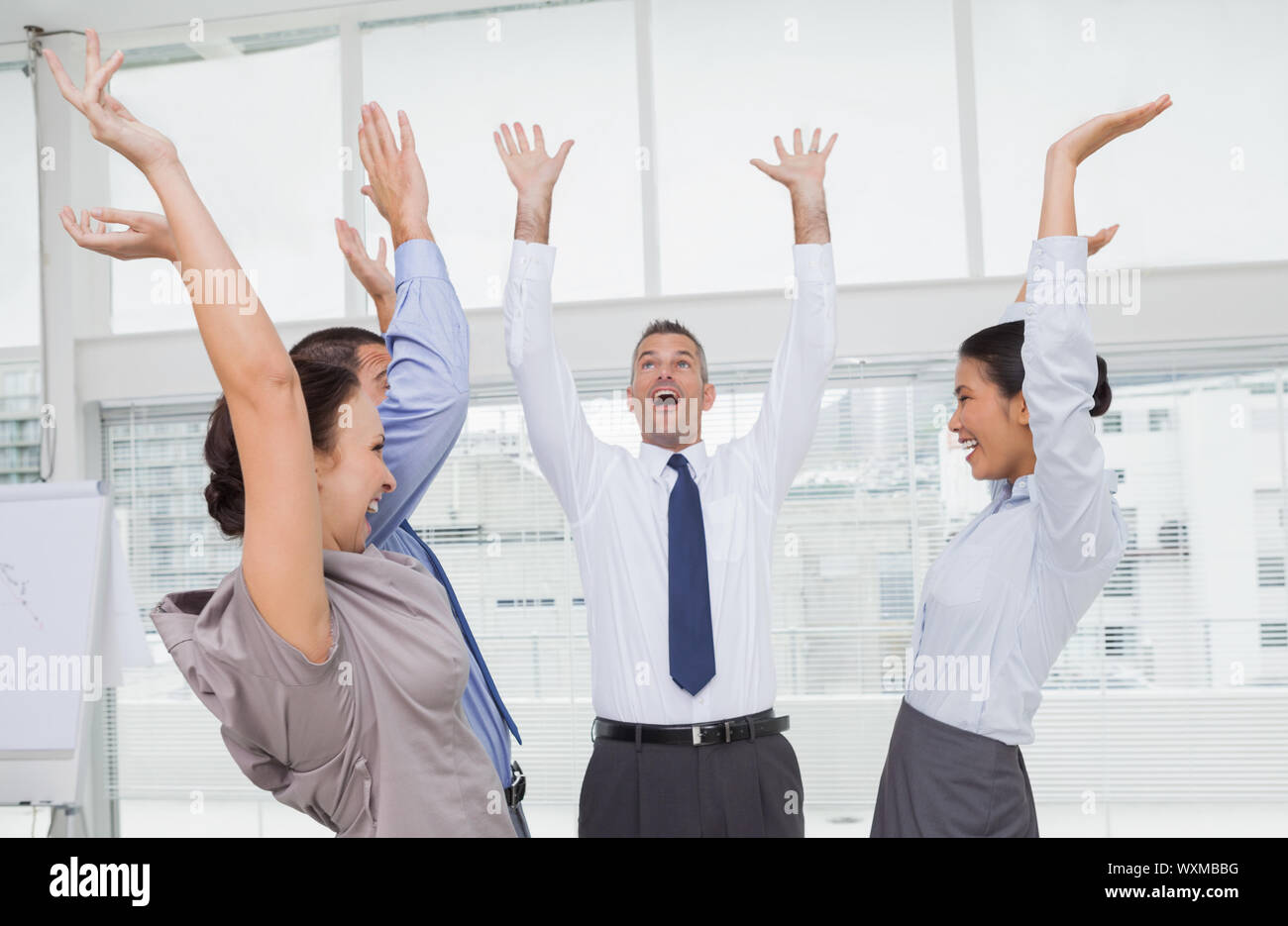 Work team cheering together hi-res stock photography and images - Alamy