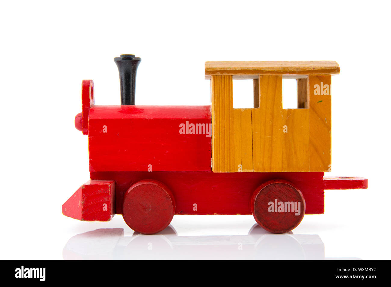 Red wooden toy locomotive isolated over white background Stock Photo ...