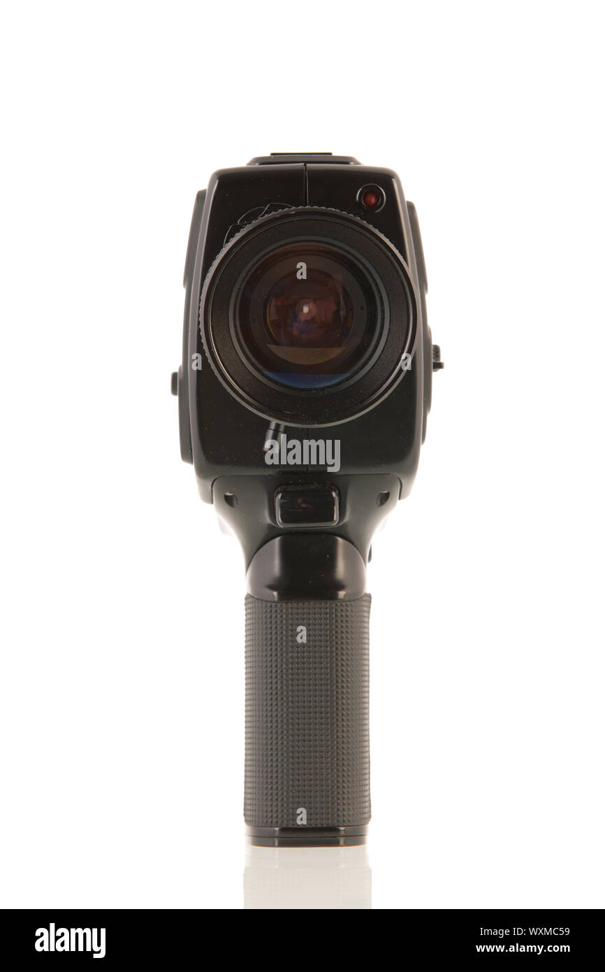 Old film camera for celluloid movie isolated over white background ...