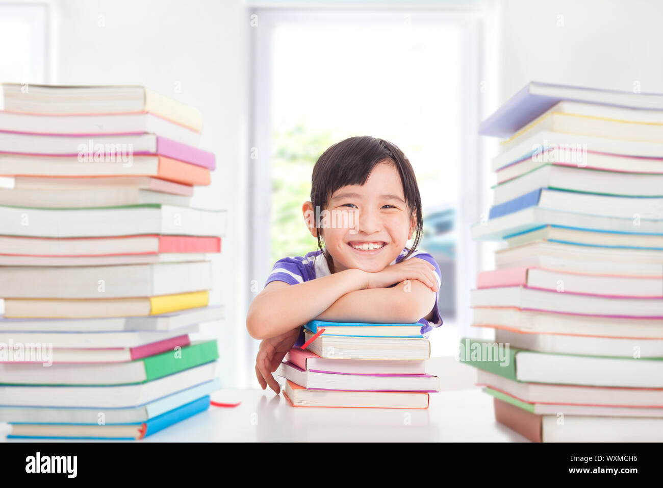 happy little enjoy studying in the classroom Stock Photo - Alamy