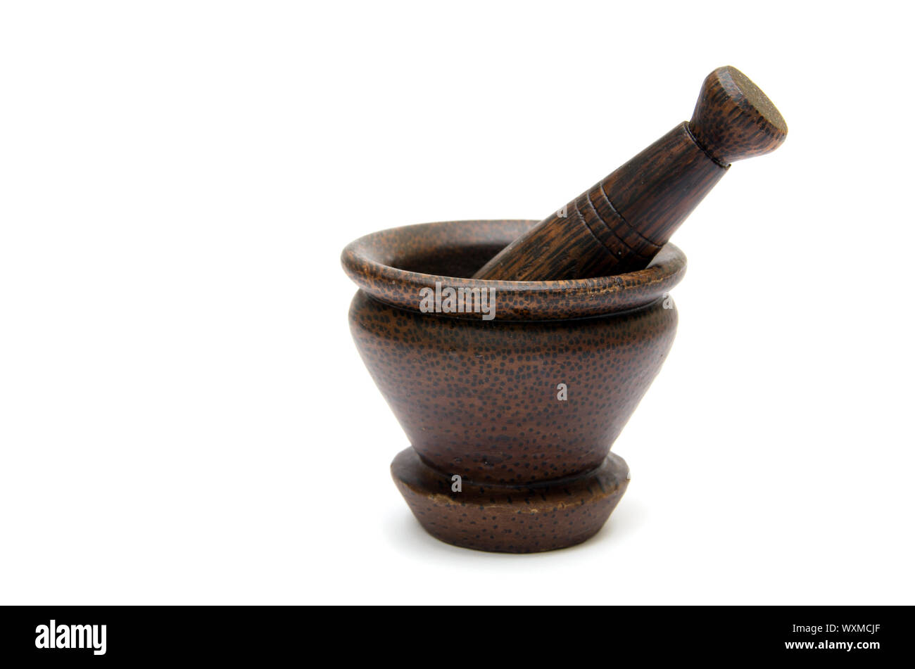 Handmade wooden mortar isolated on white background Stock Photo - Alamy