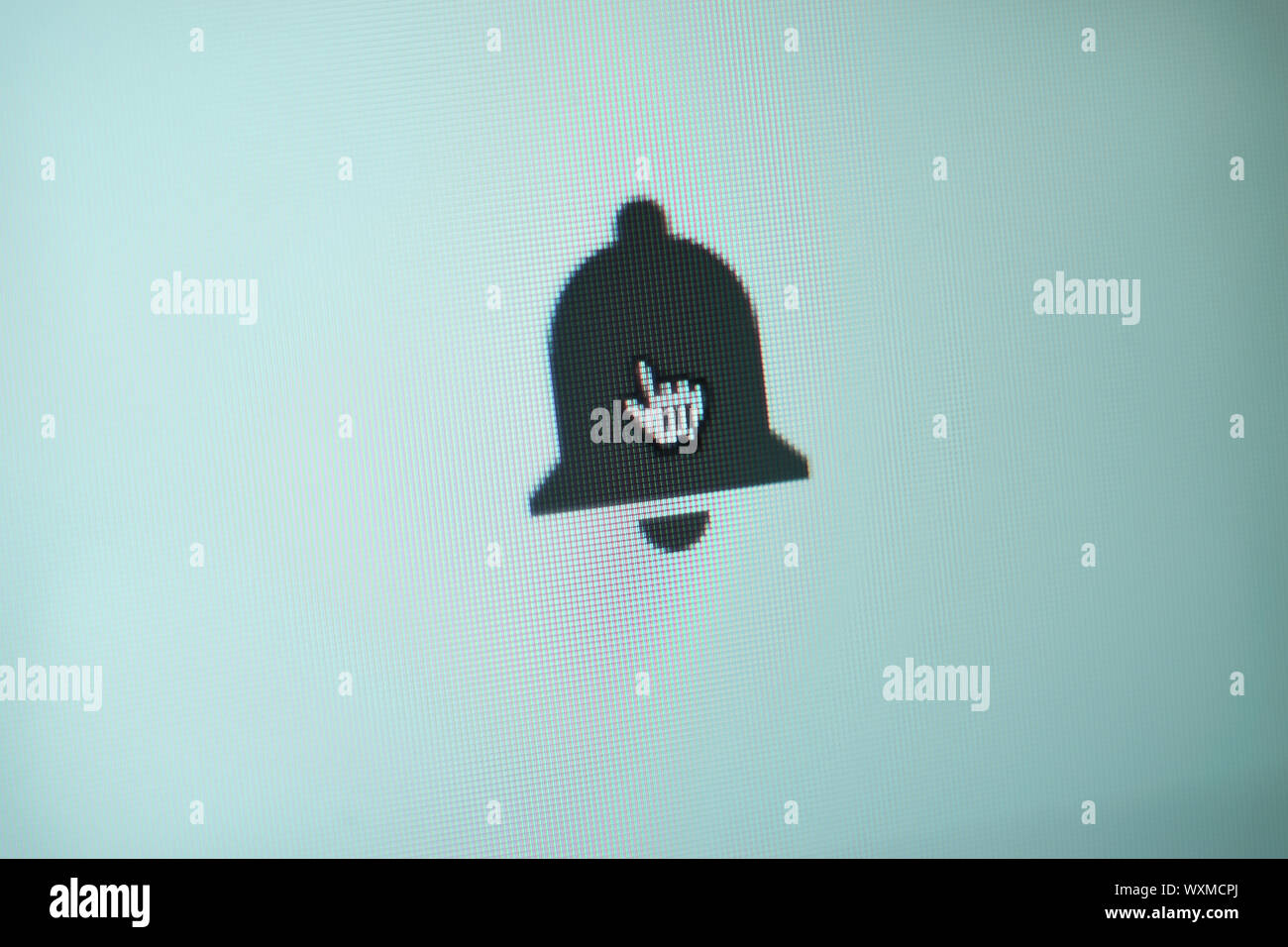 Close up Gray bell button on a white background Stock Photo - Alamy