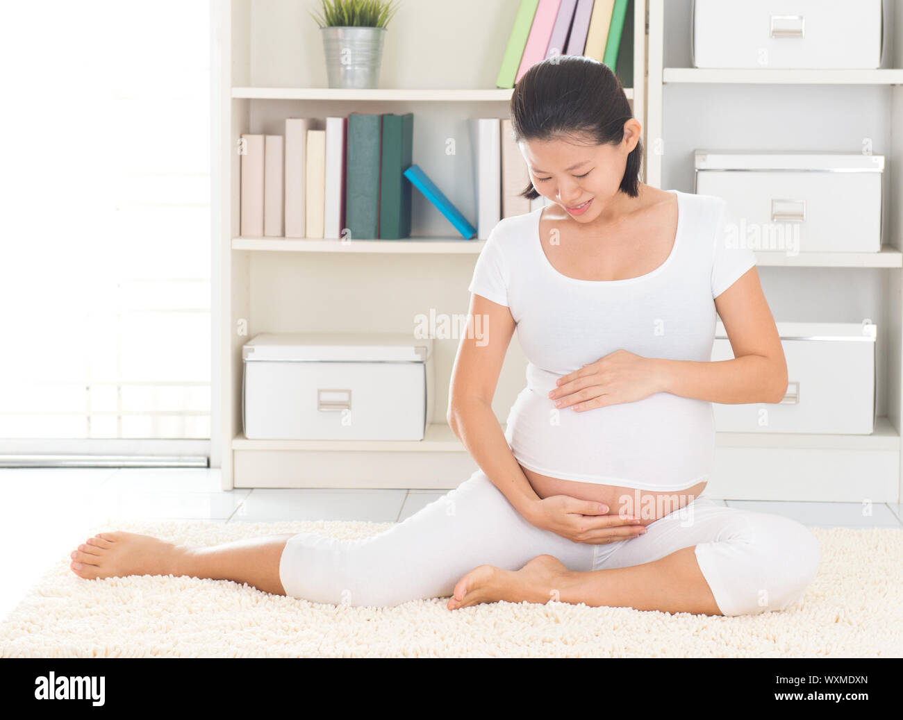 Chinese baby on tummy hi-res stock photography and images - Alamy