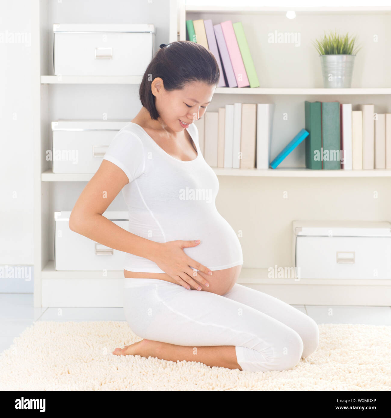 Asian 8 months pregnant woman relax at home. Pregnancy relaxation Stock ...