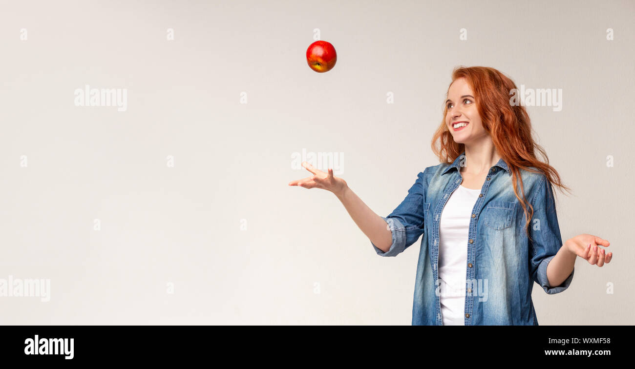 Throwing an apple hi-res stock photography and images - Alamy