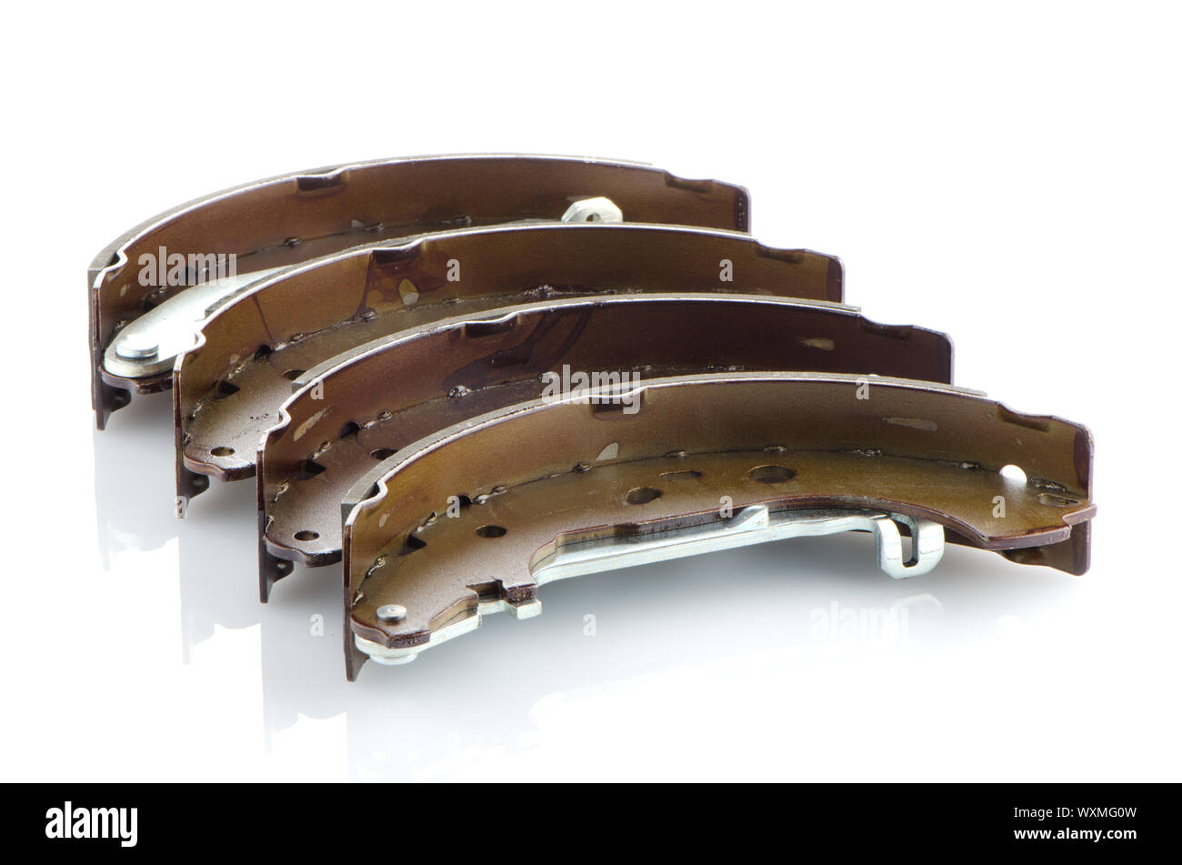 Car brake pads on white reflective background Stock Photo - Alamy