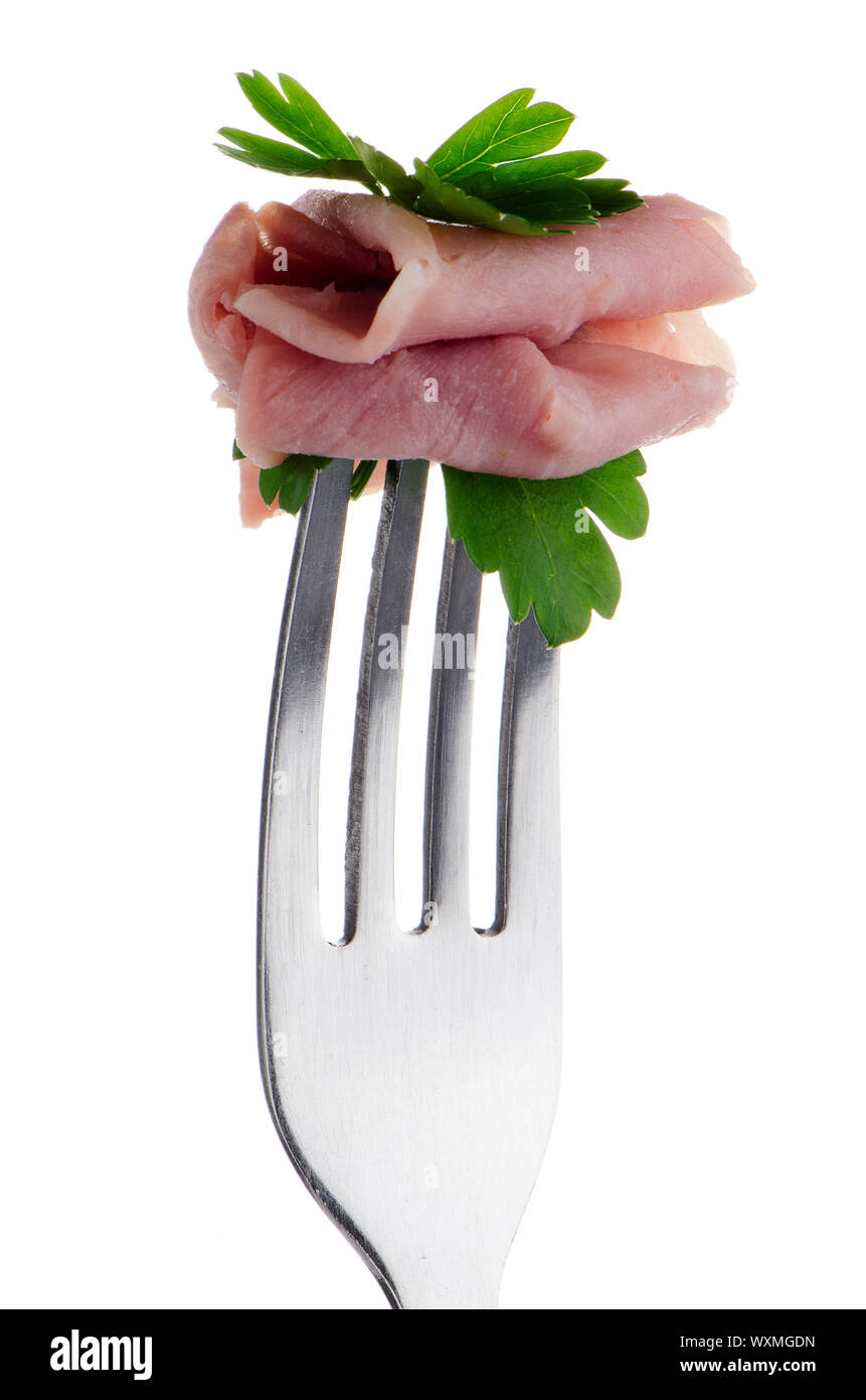 Slice of ham skewered on a fork isolated on white background Stock ...